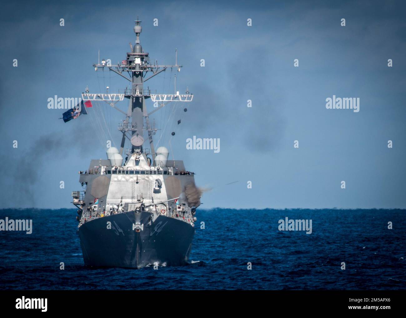 The guided missile destroyer USS Nitze (DDG 94) fires its MK-45 5 inch ...