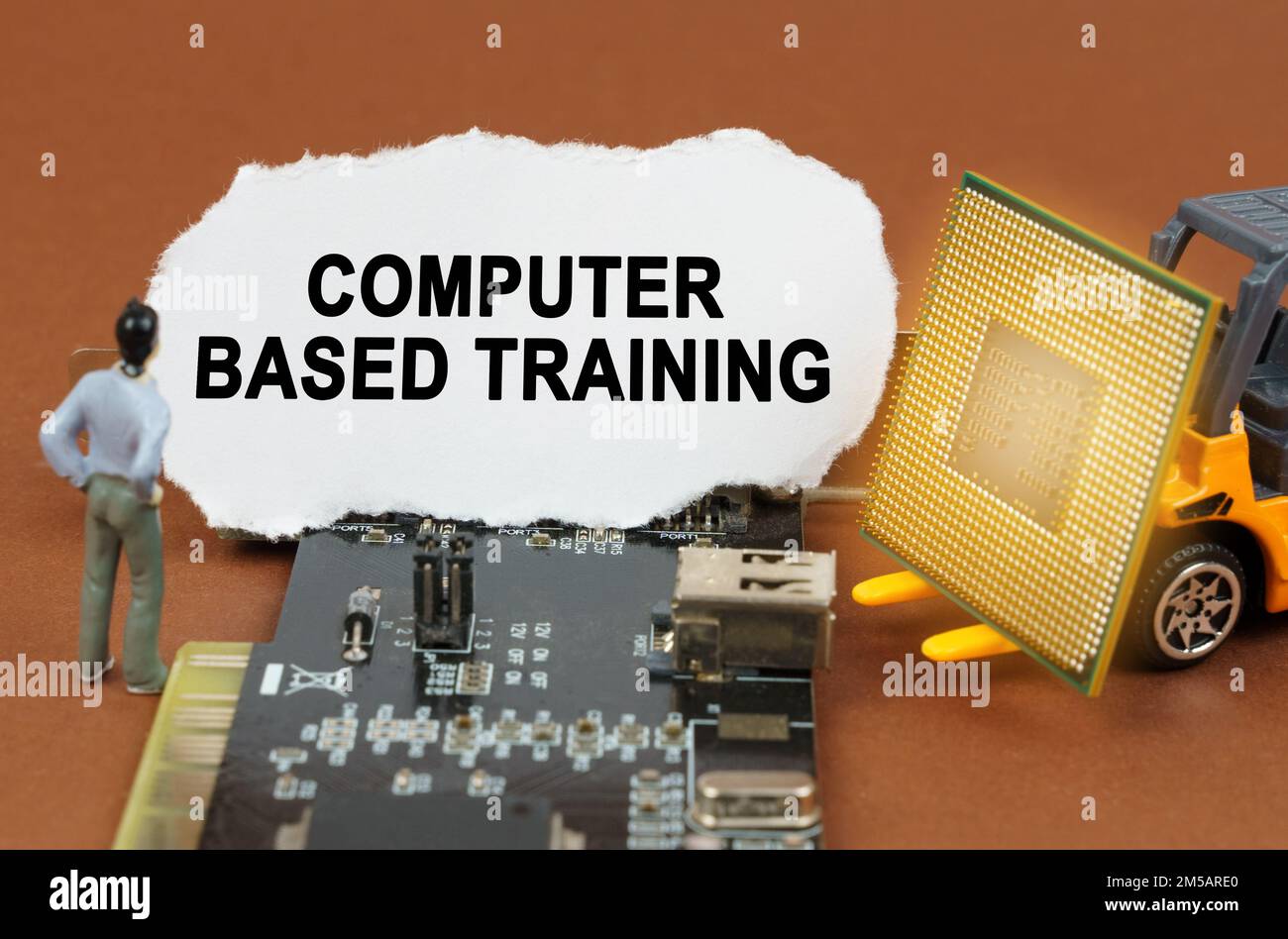 Computer concept. On the board with microcircuits lies a paper plate ...