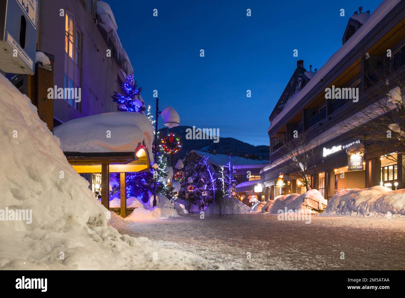 Mountain village after snowfall. Cold season, snowdrifts after a ...