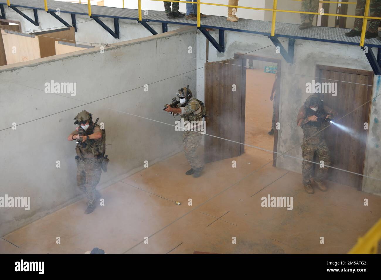 U.S. Special Forces assault a room during close quarters combat ...