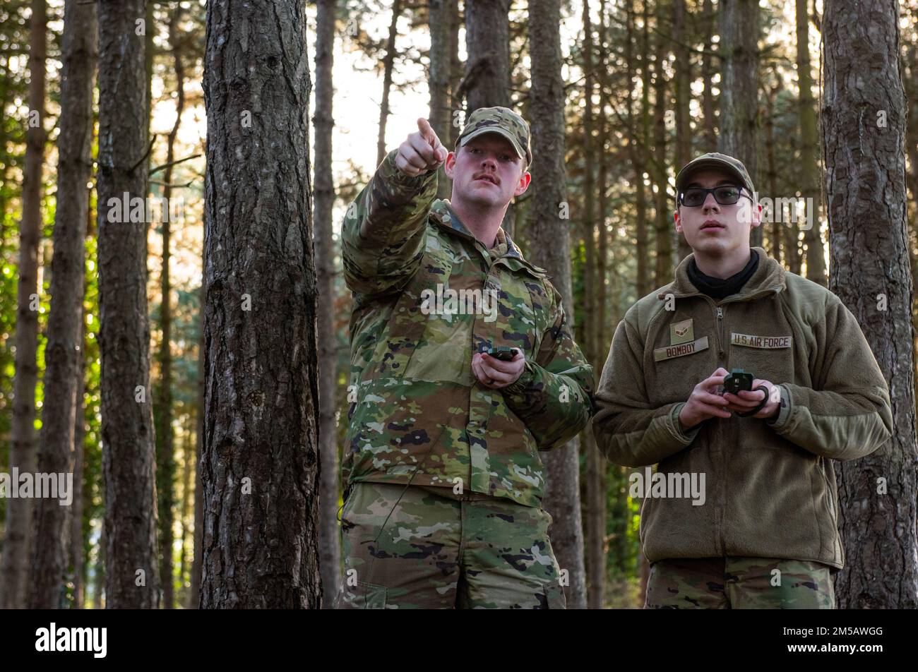 Airmen assigned to the 100th Civil Engineer Squadron navigate through ...