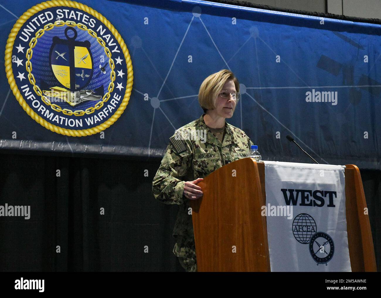 Vice Adm. Kelly Aeschbach, commander Naval Information Forces opens the ...