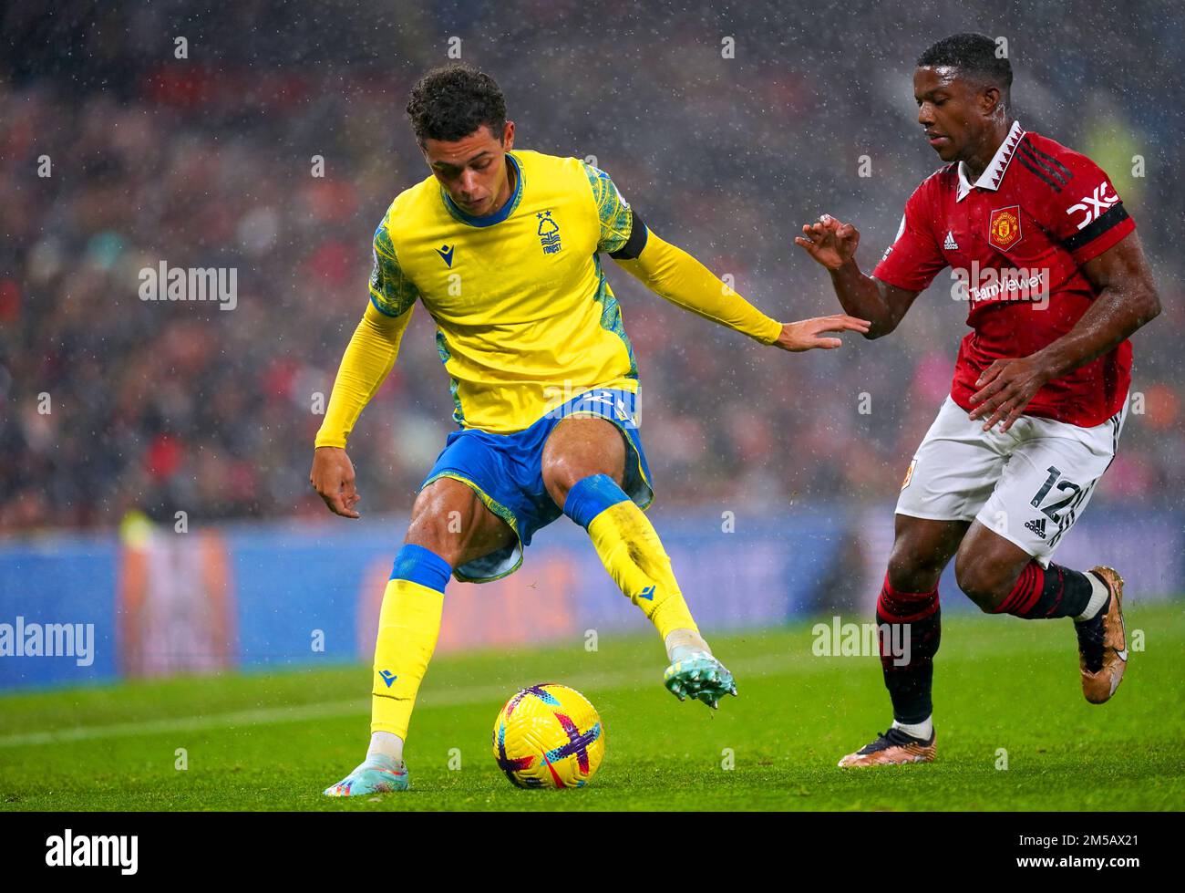 Nottingham Forest's Brennan Johnson (left) and Manchester United's ...