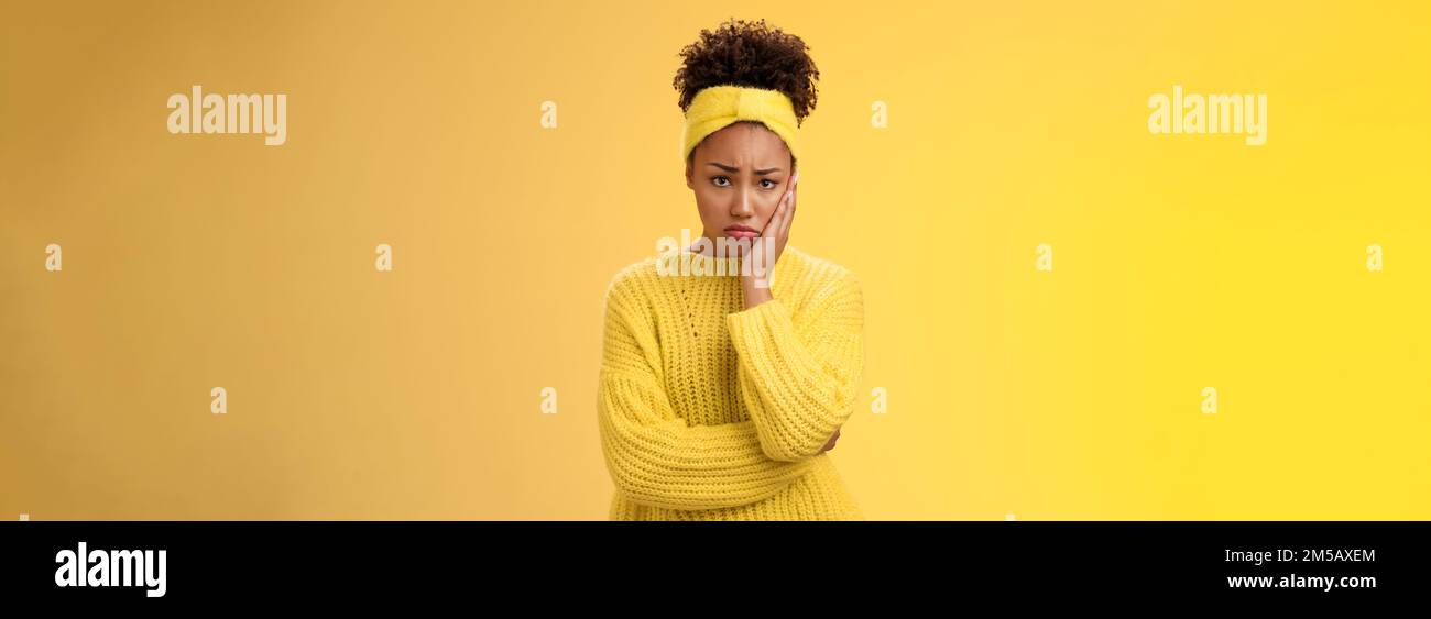 Upset cute gloomy young timid girl offended feel sadness regret touch ...