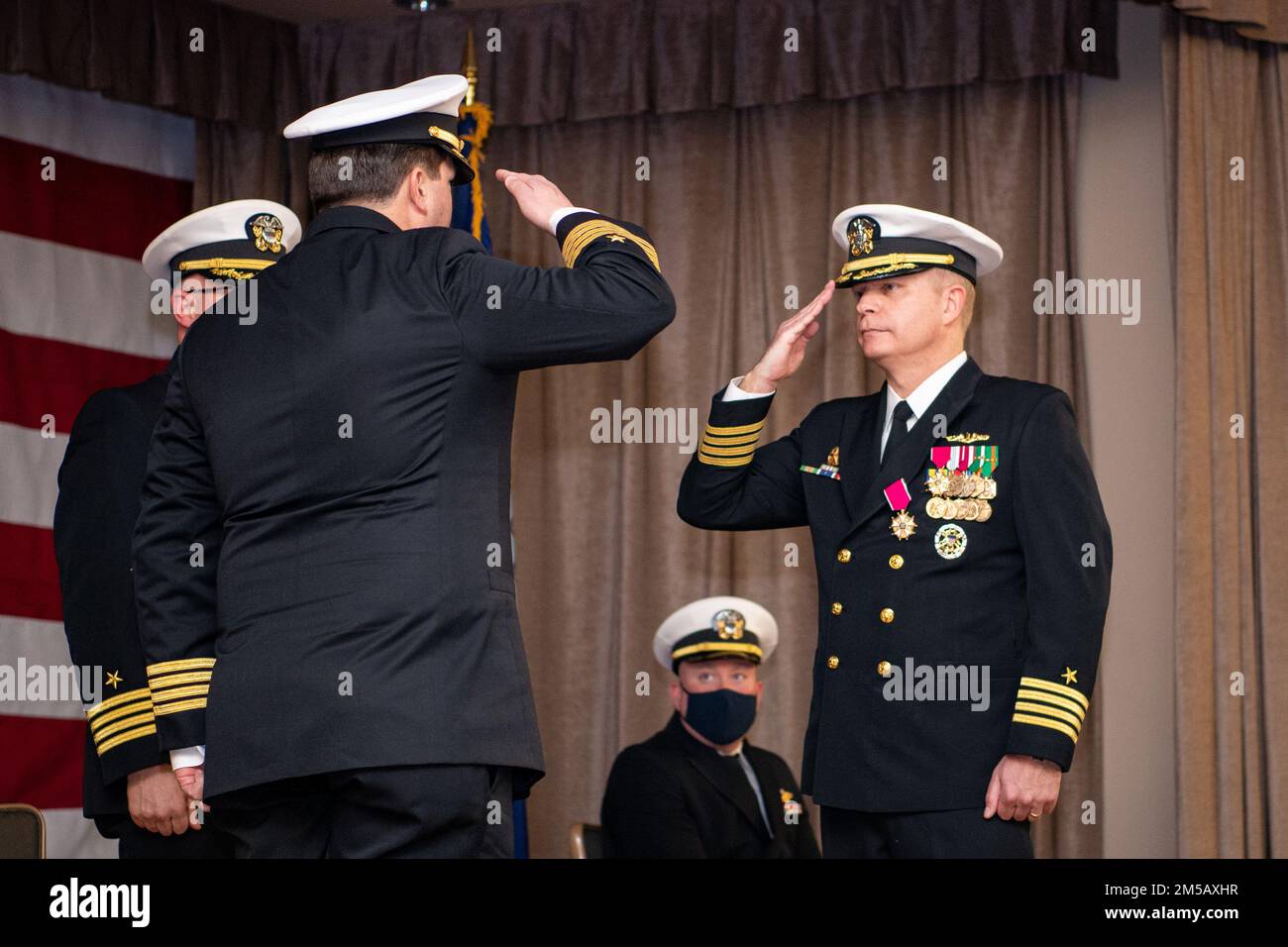 Capt. Brian Freck, right, transfers command to Capt. Micah D. Maxwell ...