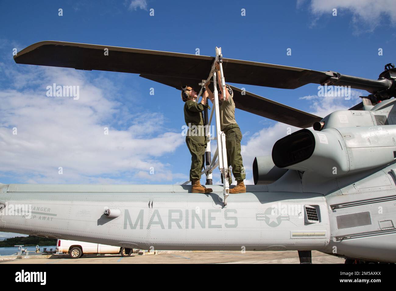 U.S. Marine Cpl. Raul Mendoza, left, and Lance Cpl. Hunter Weldon ...