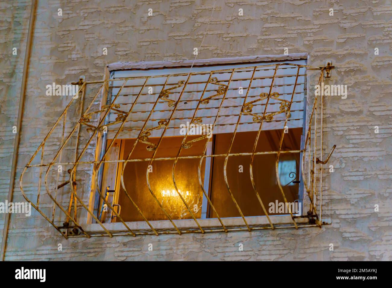 Traditional Menorahs (Hanukkah Lamps) with olive oil candles, placed ...
