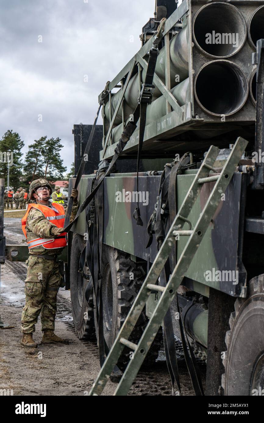 A U.S. Army Soldier with the 41st Field Artillery Brigade, secures ...
