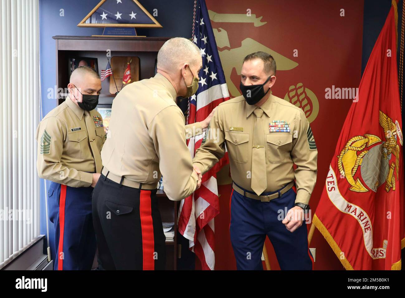 U.S. Marine Corps Maj. Gen. Jason Bohm, left, the commanding general of ...
