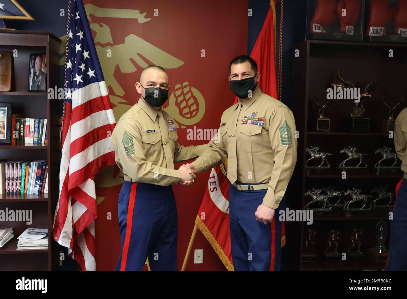U.S. Marine Corps Sgt. Maj. Adan Moreno, left, the sergeant major of ...
