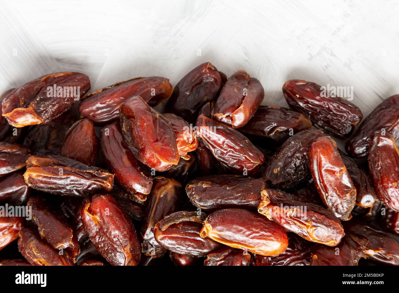 Pitted Organic Dates on gray background, top view. Flat lay, overhead ...