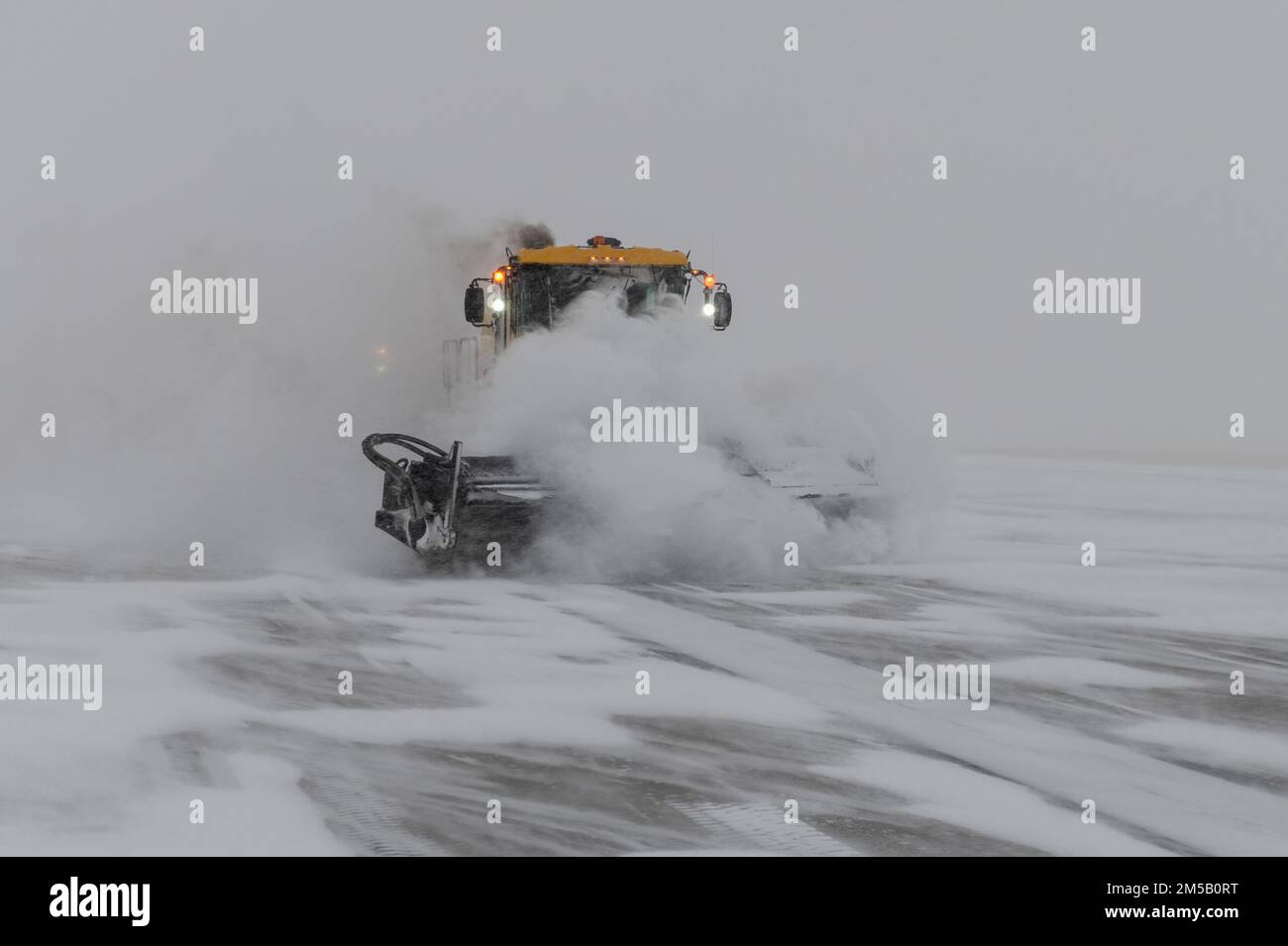 The 22nd Civil Engineering Squadron’s snow removal team plow the flight ...