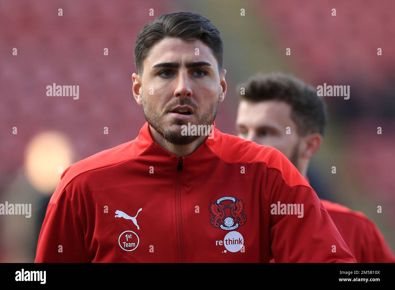London, UK. 27th Dec, 2022. Dan Happe of Leyton Orient warming up prior ...