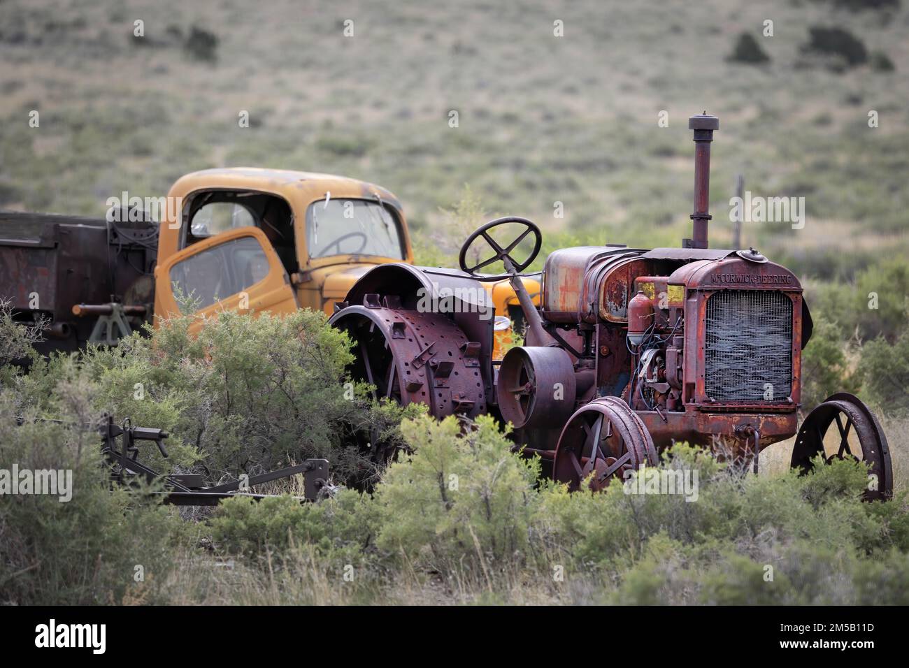 An old McCormick-Deering tractor sits abandoned in the countryside near ...