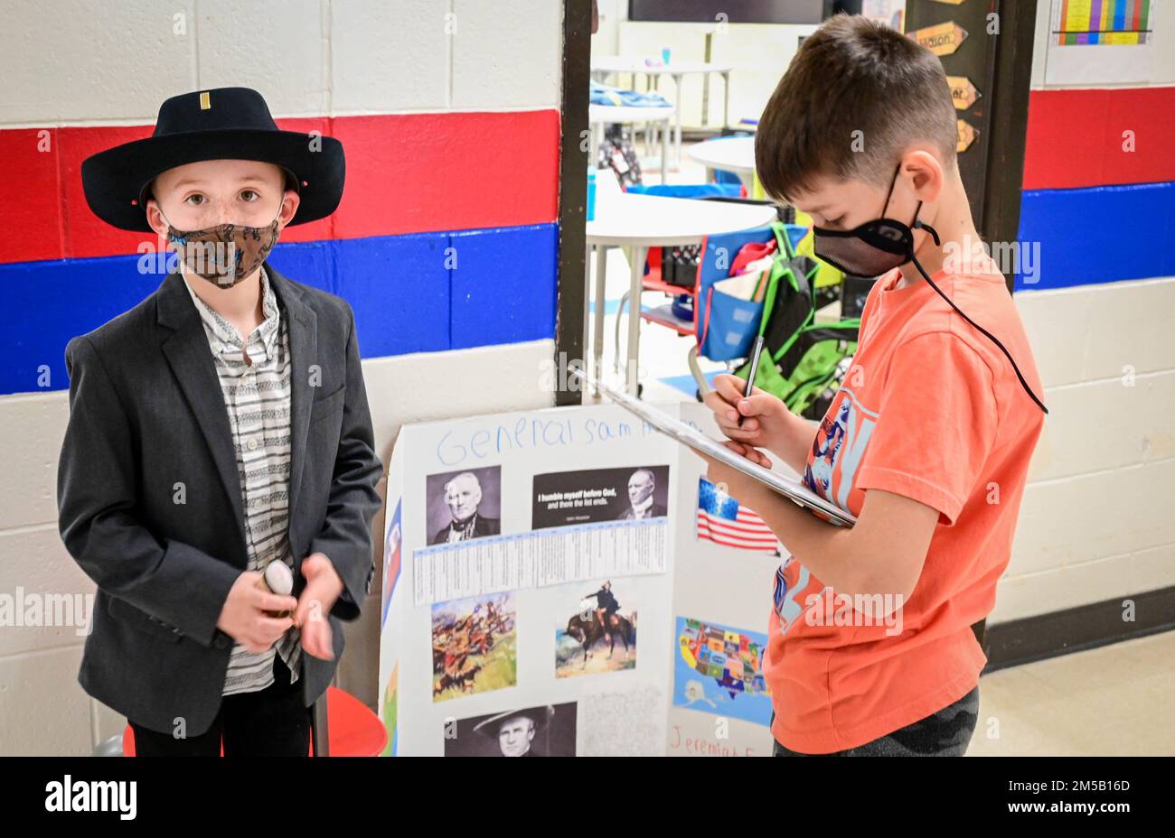 Jeremiah Frazier wears a cavalry style hat and plastic saber as he ...