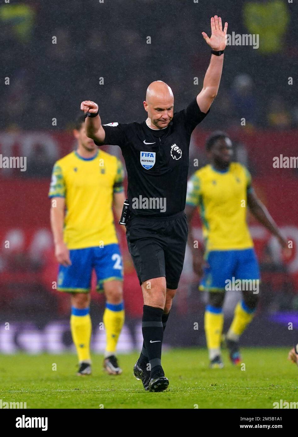 Referee Anthony Taylor signals for a VAR check before disallowing a ...
