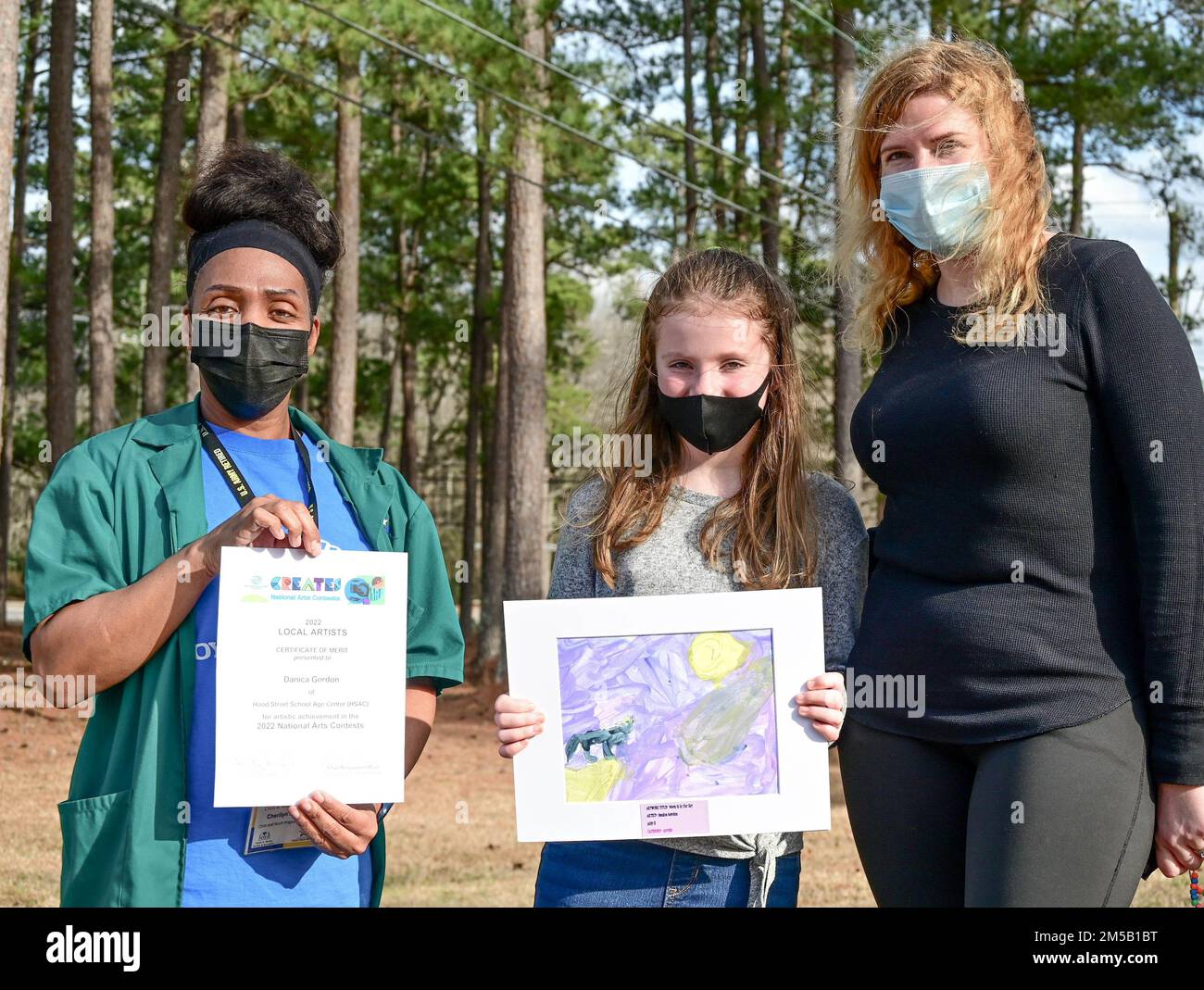 Danica Gordon shows off her wolf howling at a moon she created with her ...