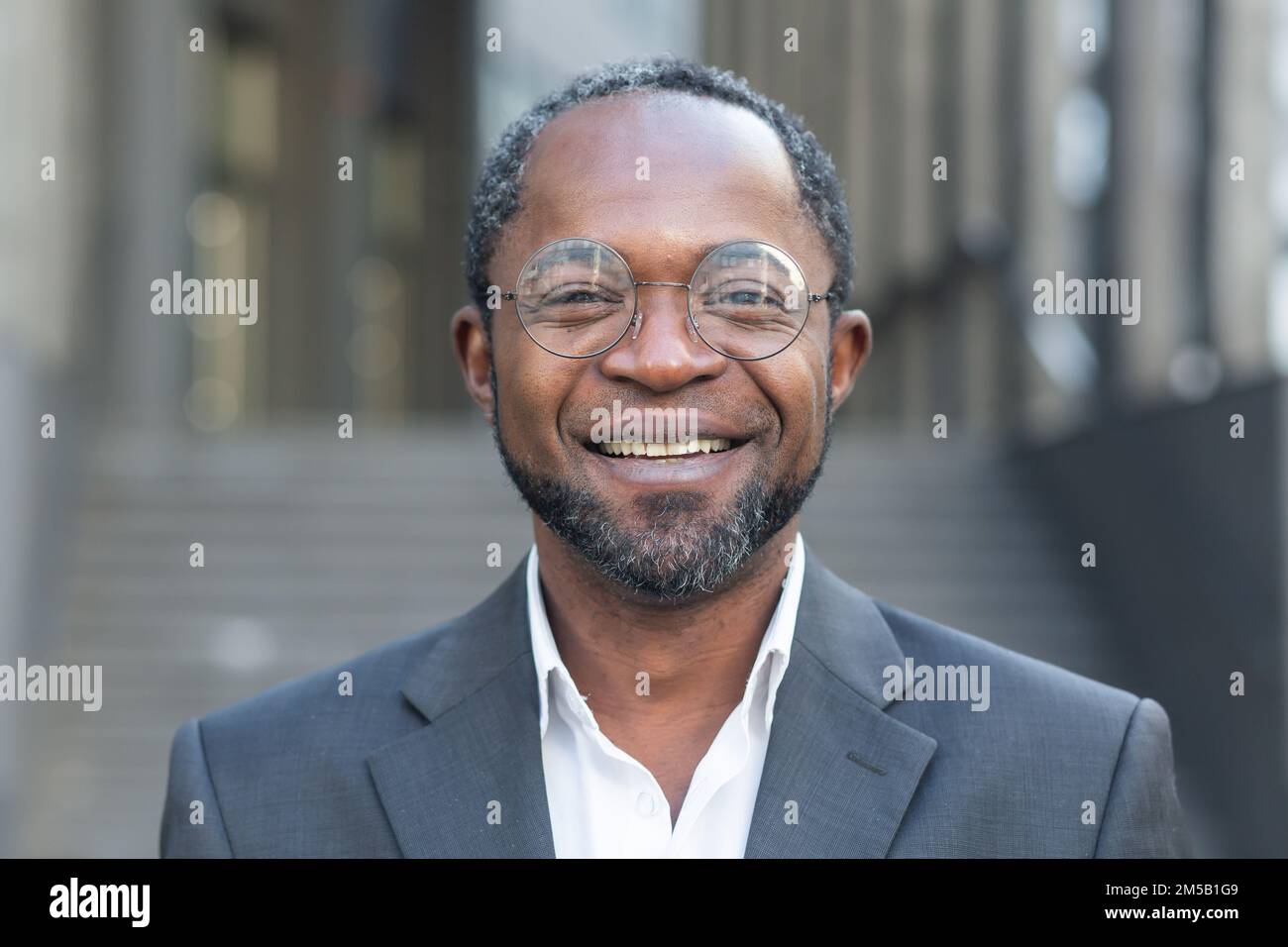 Smiling african coach leader hi-res stock photography and images - Alamy