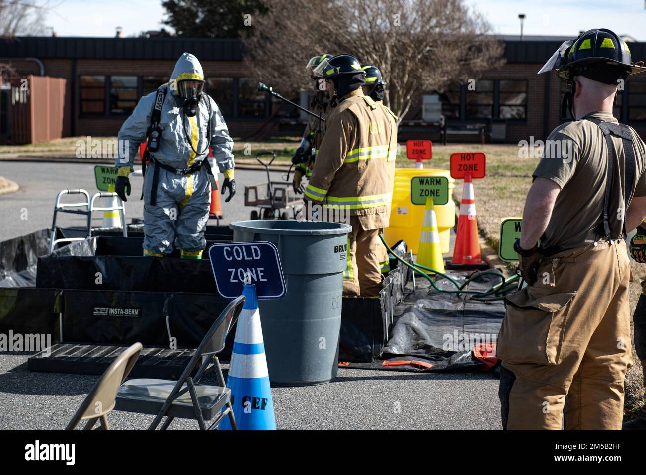 U.S. Airmen with the 633d Civil Engineer Squadron work through a "Warm ...