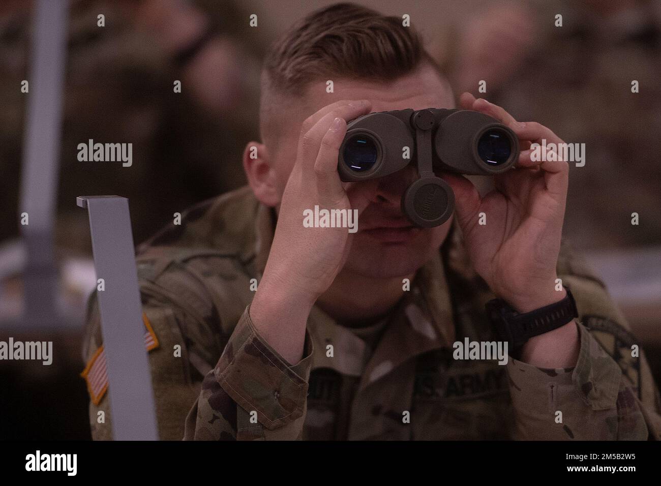 A Boise State University Cadet searches the landscape view to locate ...