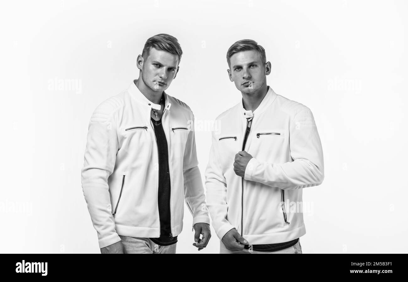 twin brothers men in white casual clothes look alike, identically Stock ...