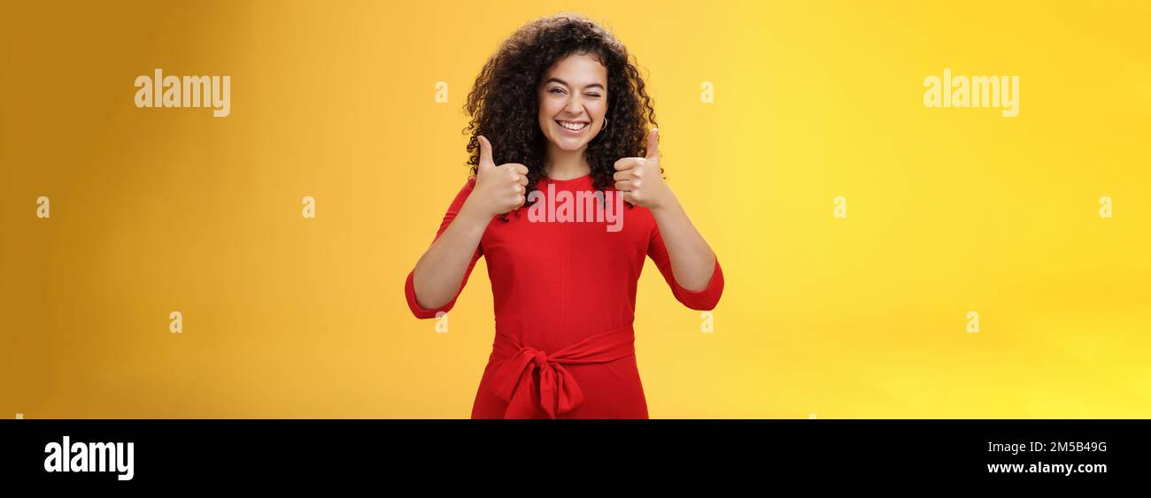 Creative and charismatic happy upbeat woman 25s with curly hair in red ...