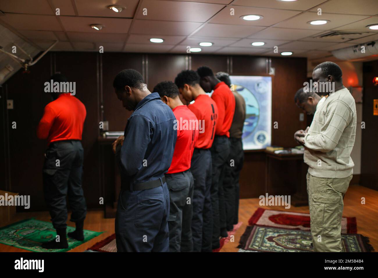 PHILIPPINE SEA (Feb. 18, 2022) Sailors pray during a Muslim religious ...