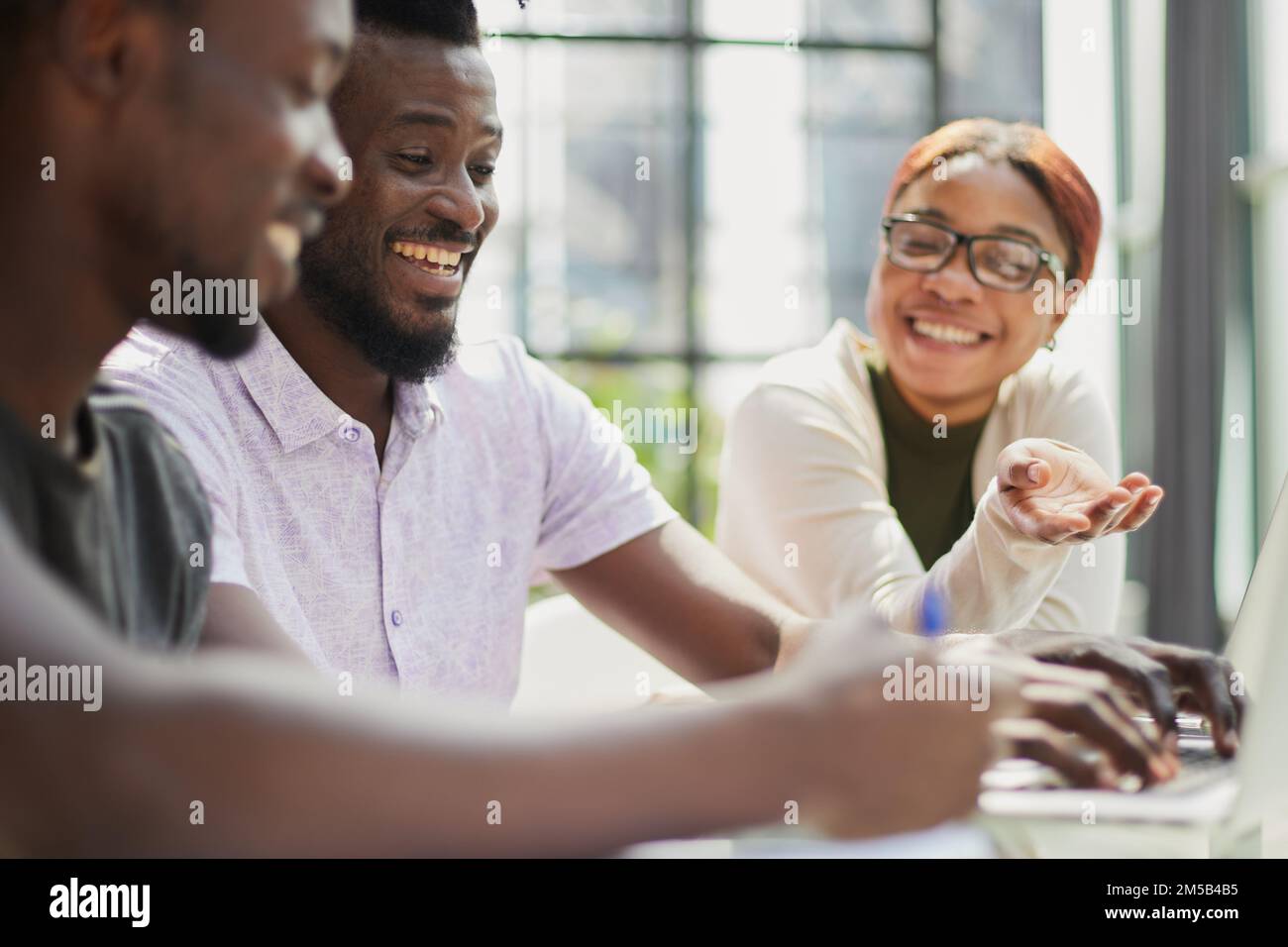 Successful african american business team talking about strategy at ...