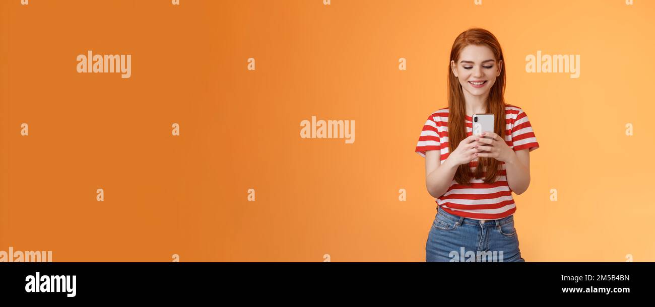 Friendly outgoing modern ginger girl communicating friends, chatting ...