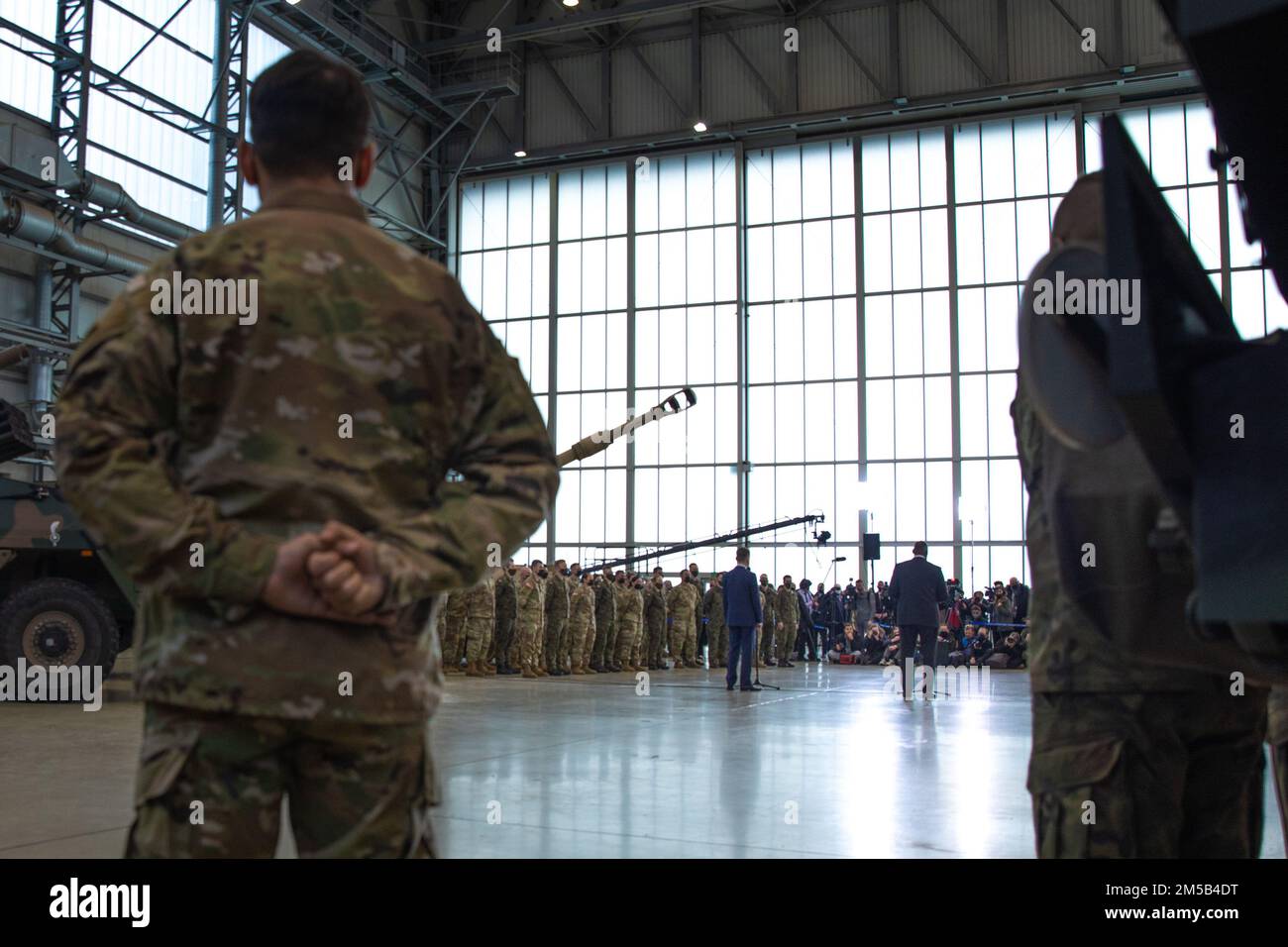 U.S. Army Soldiers stand at parade rest in front of the military ...