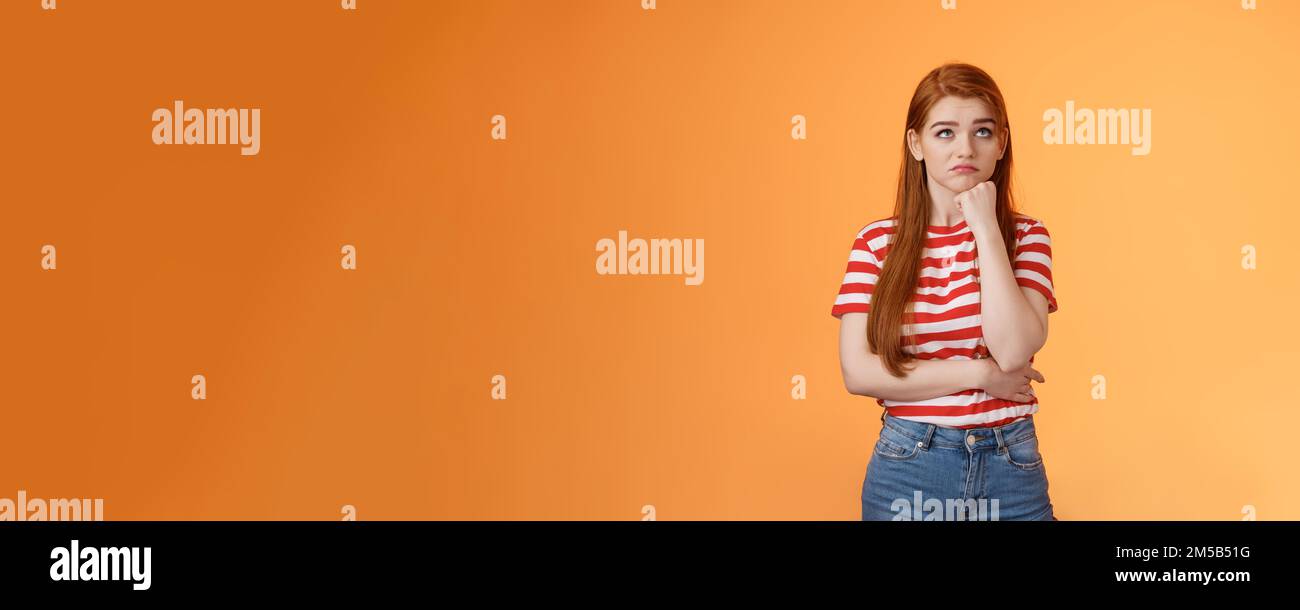 Upset redhead woman losing lottery feel uneasy distressed, look up ...