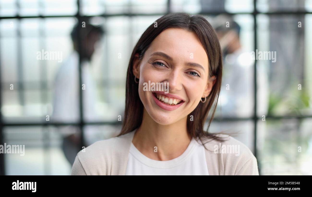 Smiling professional business leaders and employees group team portrait ...