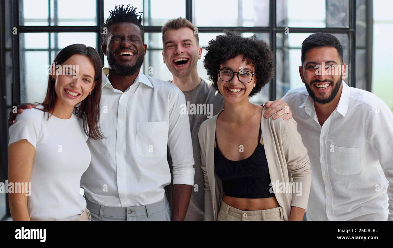 Smiling professional business leaders and employees group team portrait ...