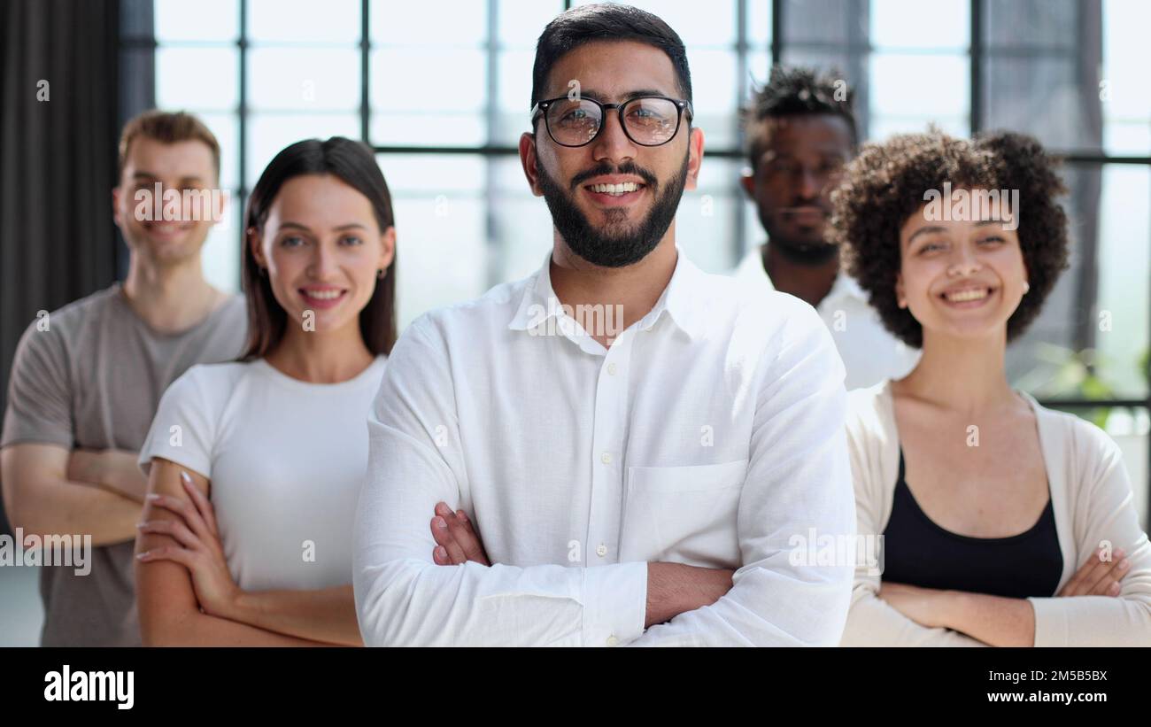 Smiling professional business leaders and employees group team portrait ...