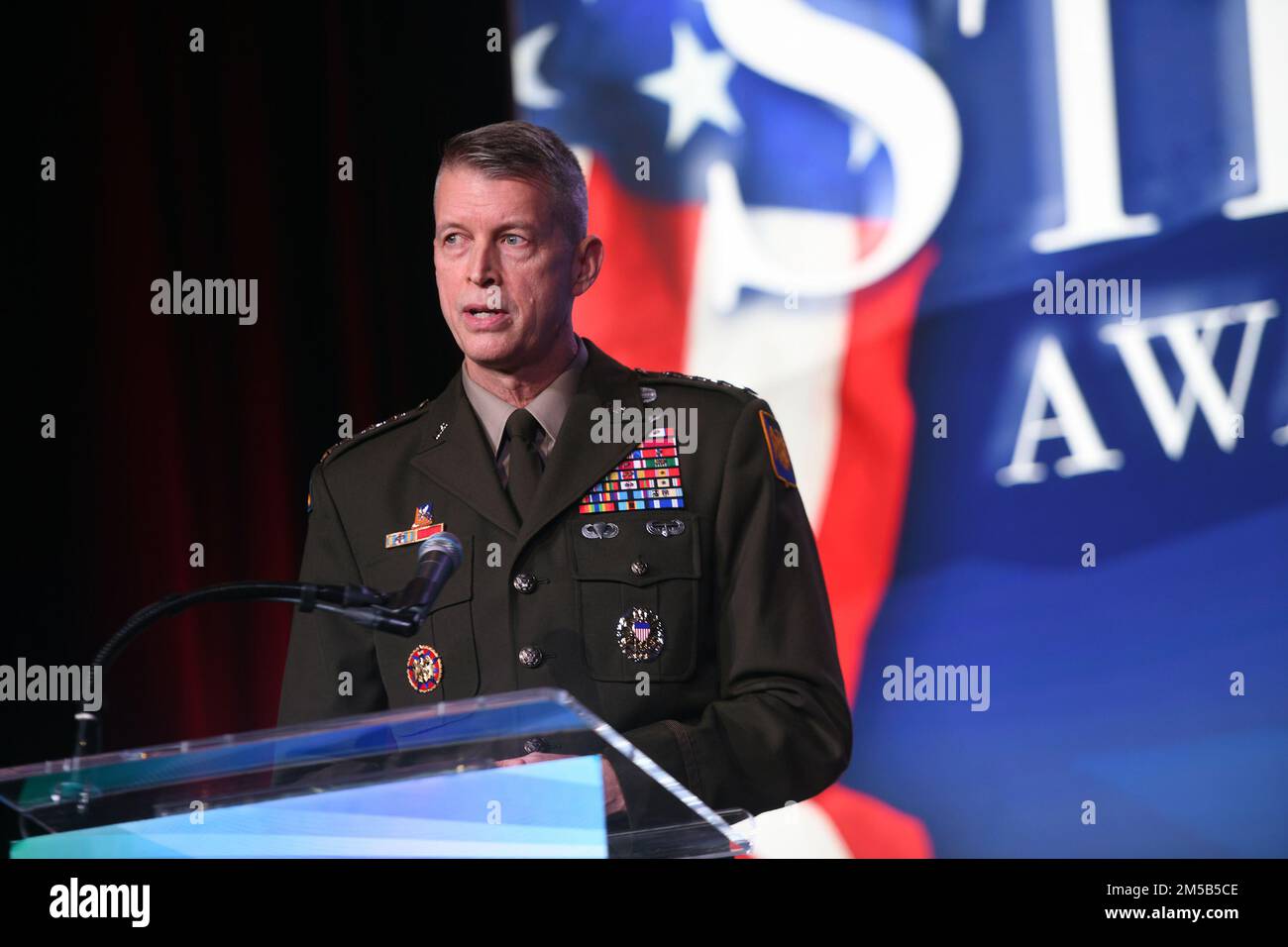 Army Gen. Daniel Hokanson, chief, National Guard Bureau, congratulates ...