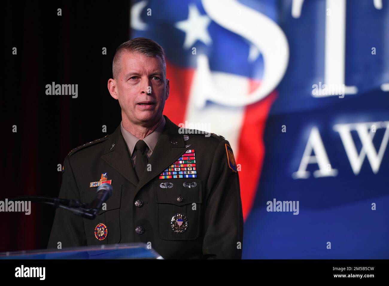 Army Gen. Daniel Hokanson, chief, National Guard Bureau, congratulates ...