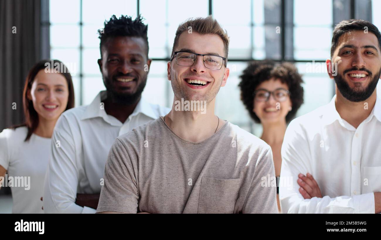 Smiling professional business leaders and employees group team portrait ...