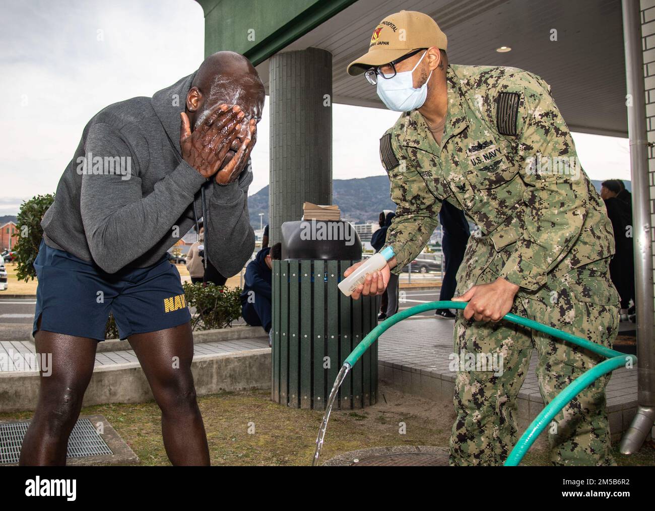 Hospital Corpsman 3rd Class Mitchell Harris assists Hospital Corpsman ...