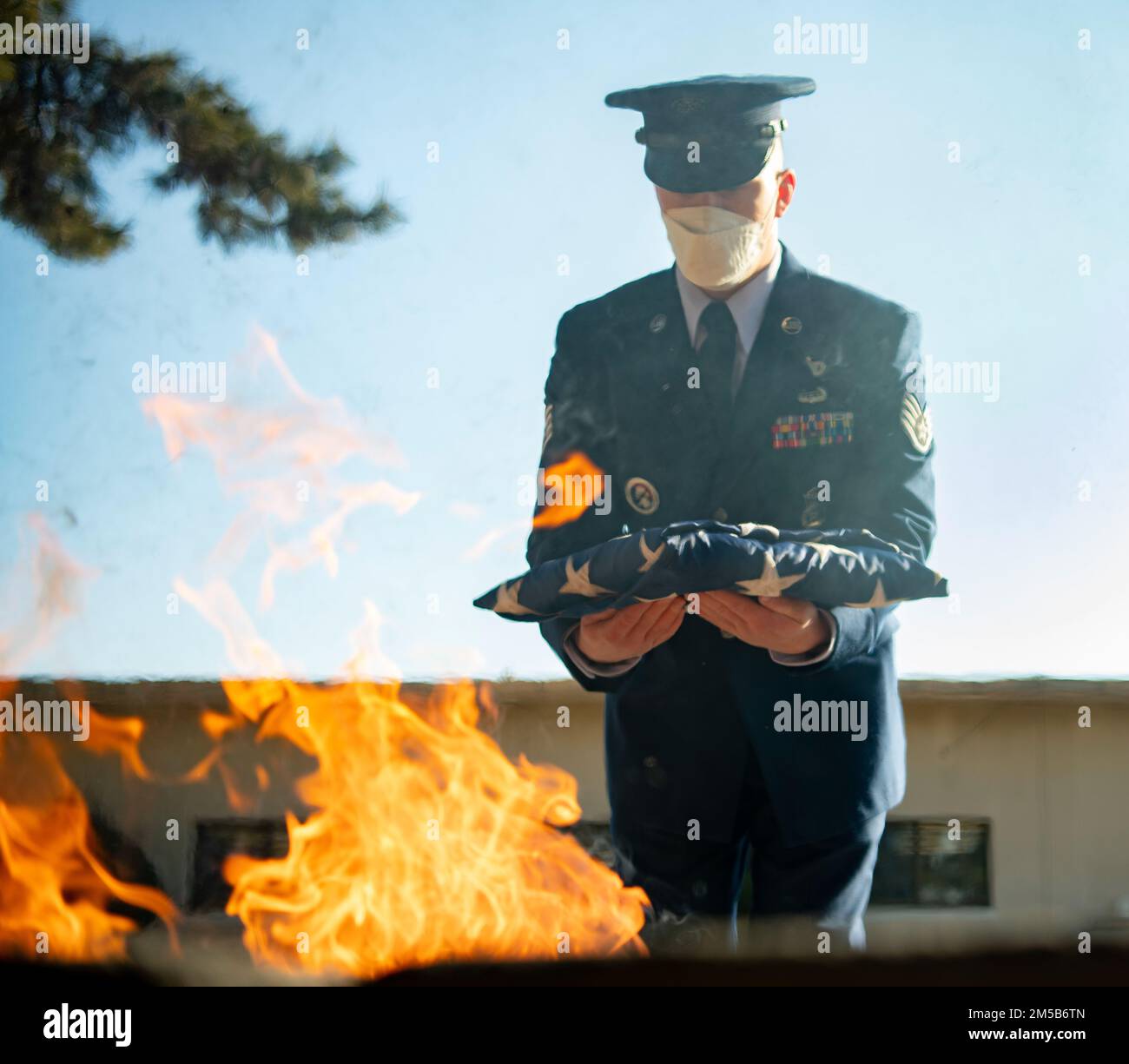 Staff Sgt. John Broda, 8th Fighter Wing Base Honor Guardsman, places a ...