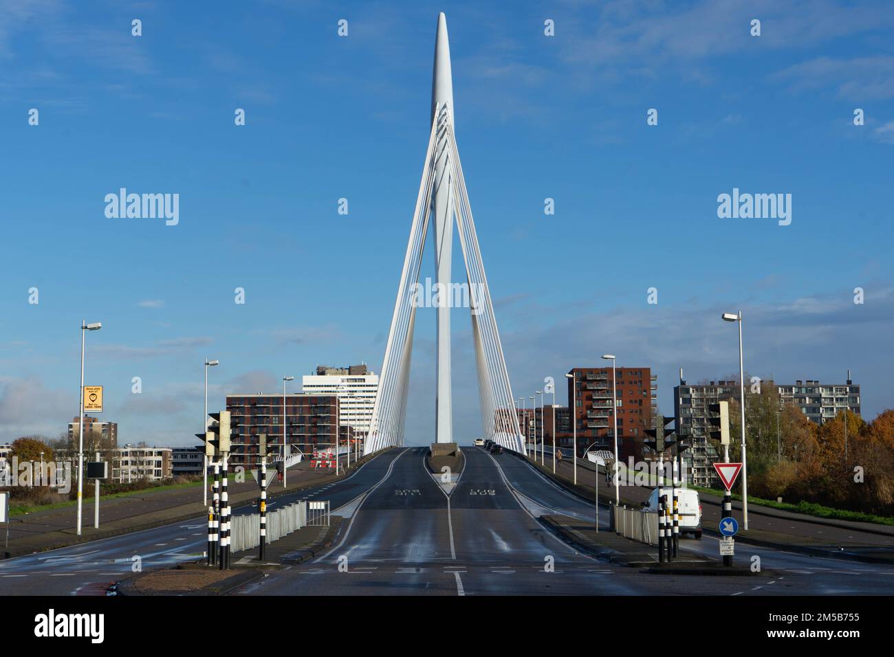 An empty view of the white Prins Claus bridge with blue sky Stock Photo ...