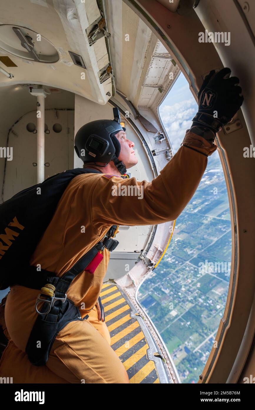 Sgt. 1st Class Danny Hellman of the U.S. Army Parachute Team looks out ...