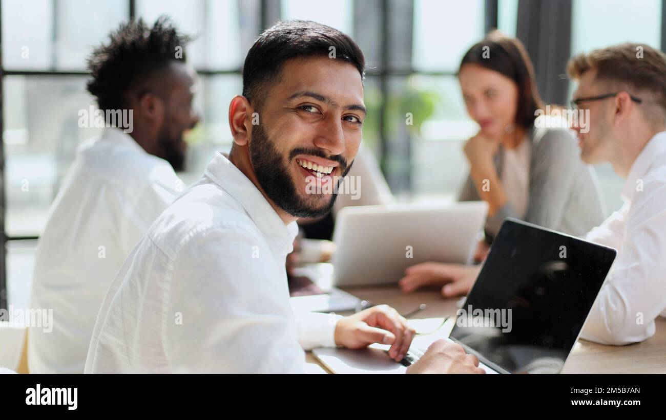 Smiling professional business leaders and employees group team portrait ...