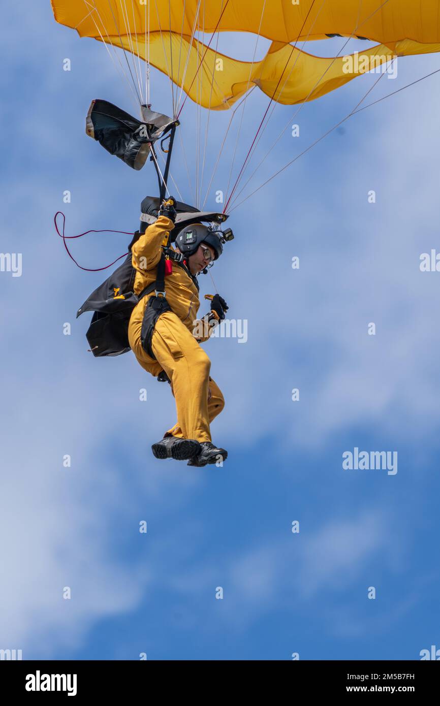 Sgt. Nicholas Orozco of the U.S. Army Parachute Team lands his ...