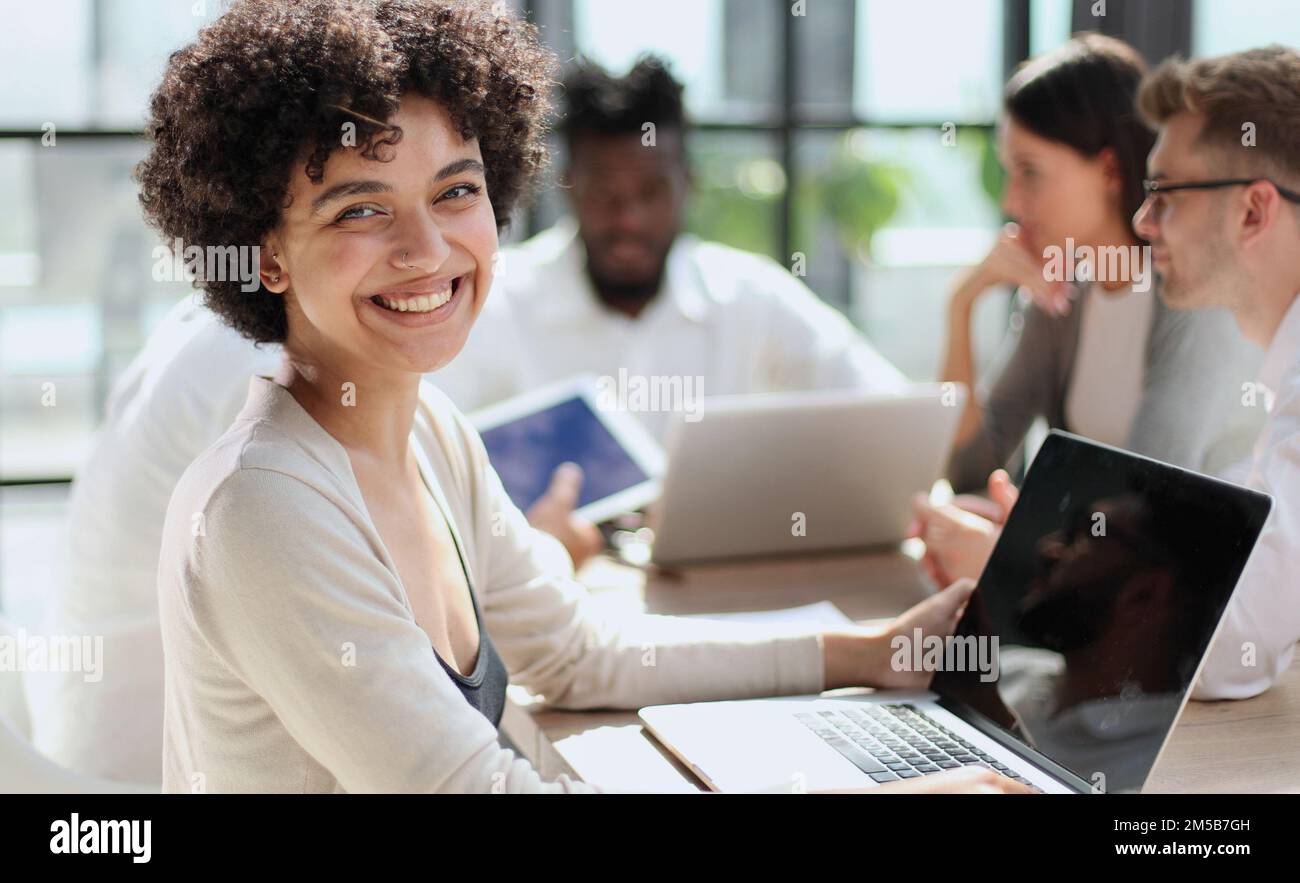 Smiling professional business leaders and employees group team portrait ...