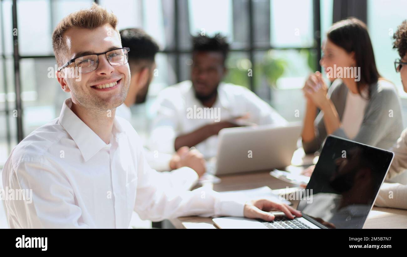 Smiling professional business leaders and employees group team portrait ...