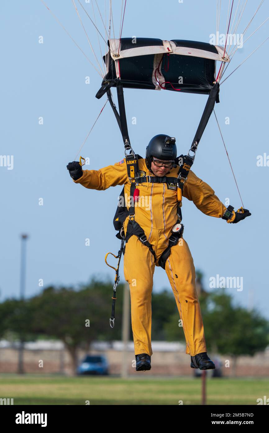 Sgt. Nicholas Orozco of the U.S. Army Parachute Team lands his ...