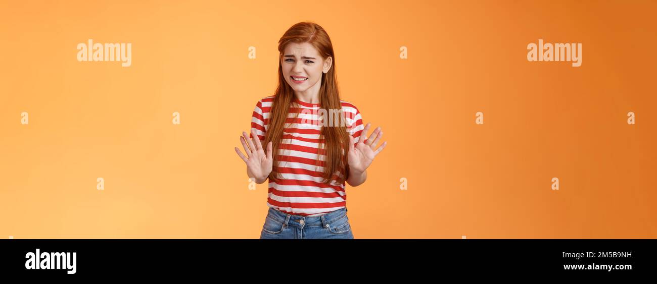 Reluctant bothered cute redhead girl apologizing make stop refusal sign ...