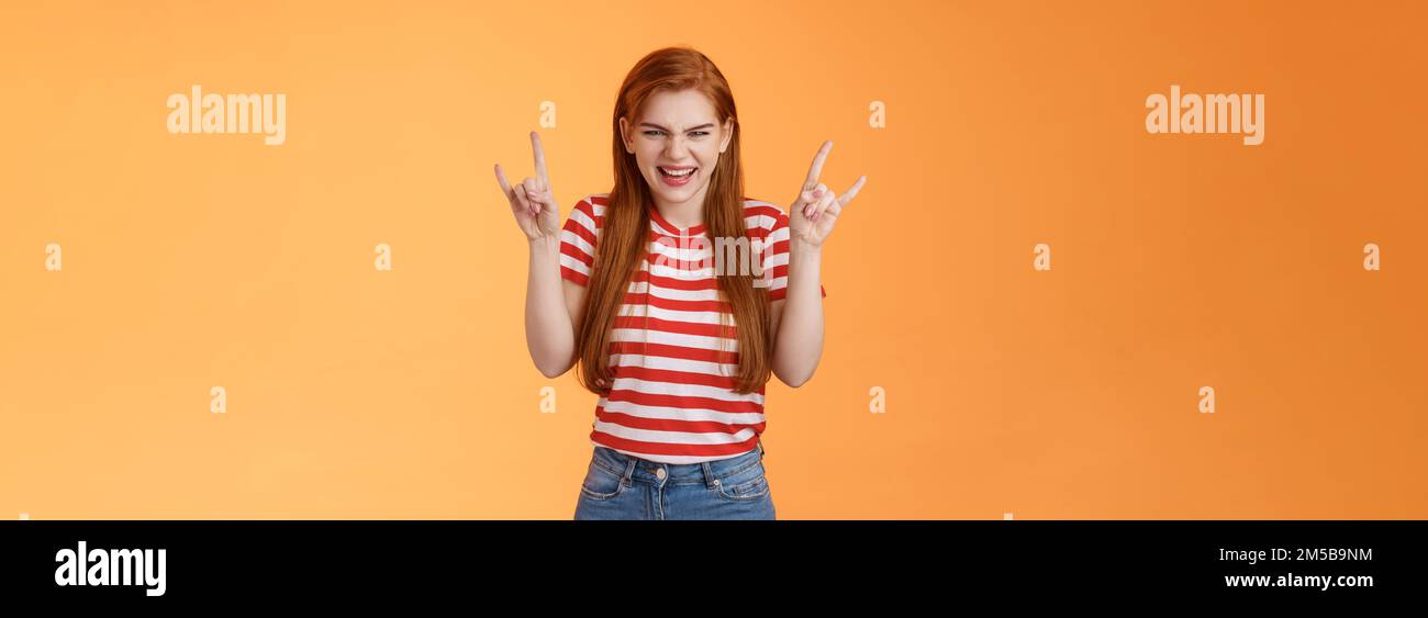 Rebellious sassy good-looking caucasian redhead woman partying having ...