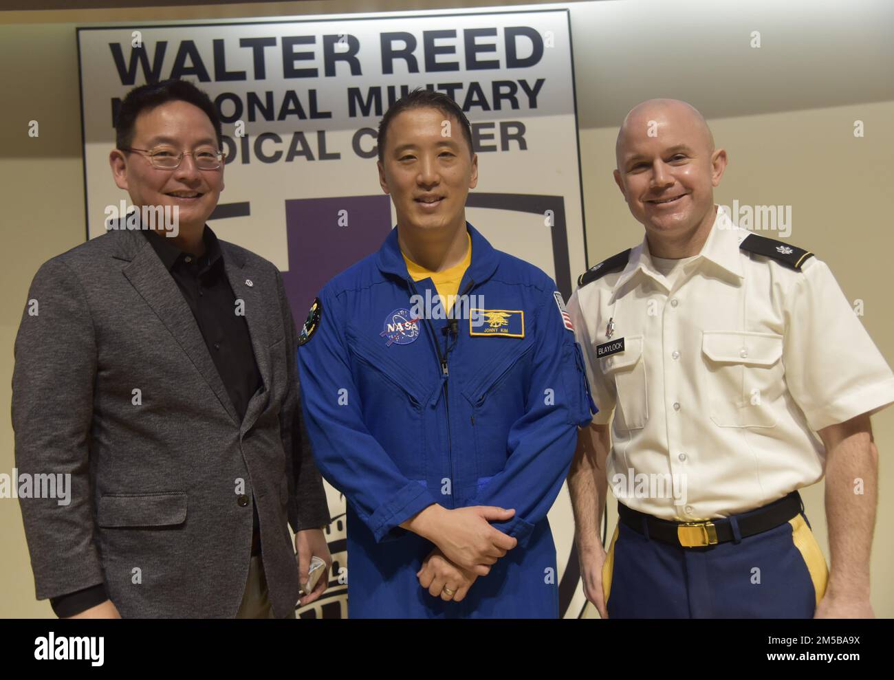 Lt. Cmdr. Jonny Kim, center, a Naval astronaut, poses for a photo with ...