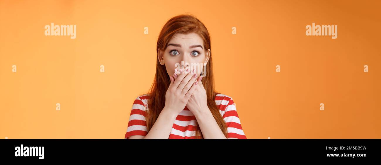 Close-up surprised shocked red girl, stare camera speechless, shut ...